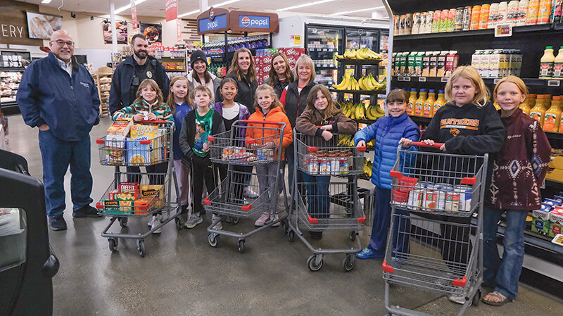 The spirit of giving: Elementary schools donate food to Loaves and ...